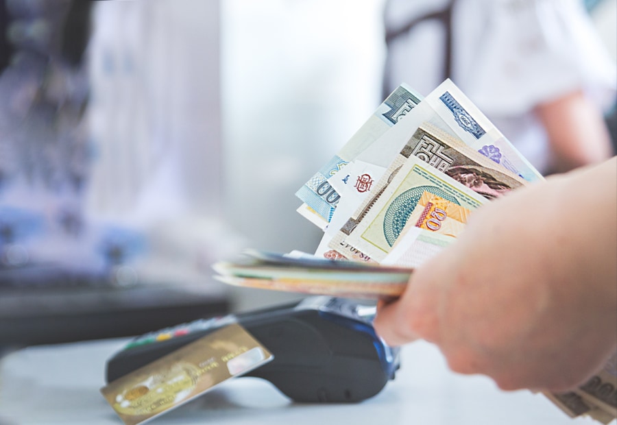 How to do currency exchange wisely while travelling abroad?